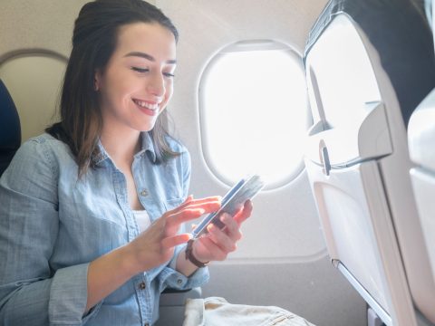 Complete Guide to Using a Cell Phone on a Plane - Nomad Veronica
